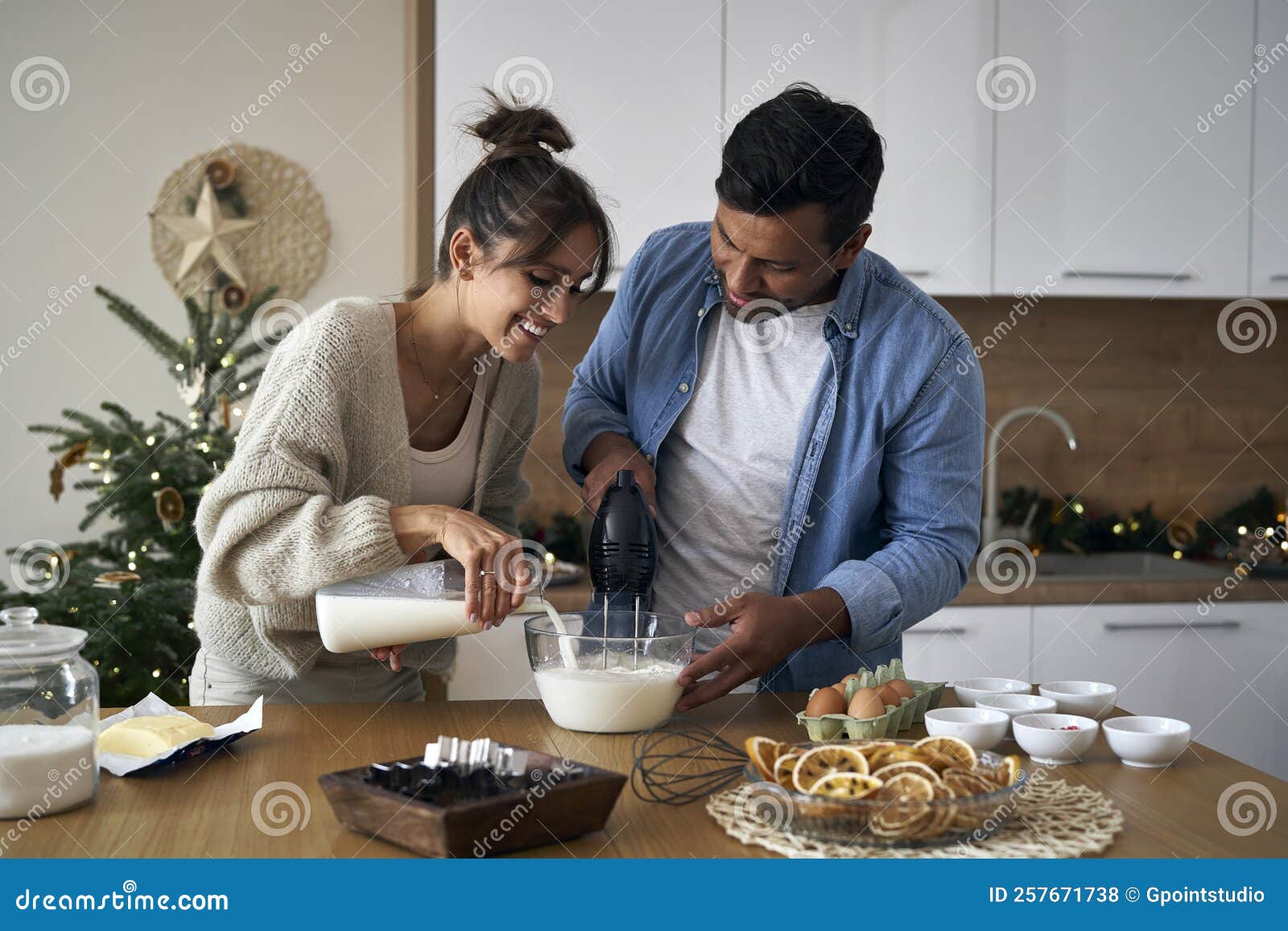 Couple Baking Together during the Christmas Stock Photo - Image of love ...
