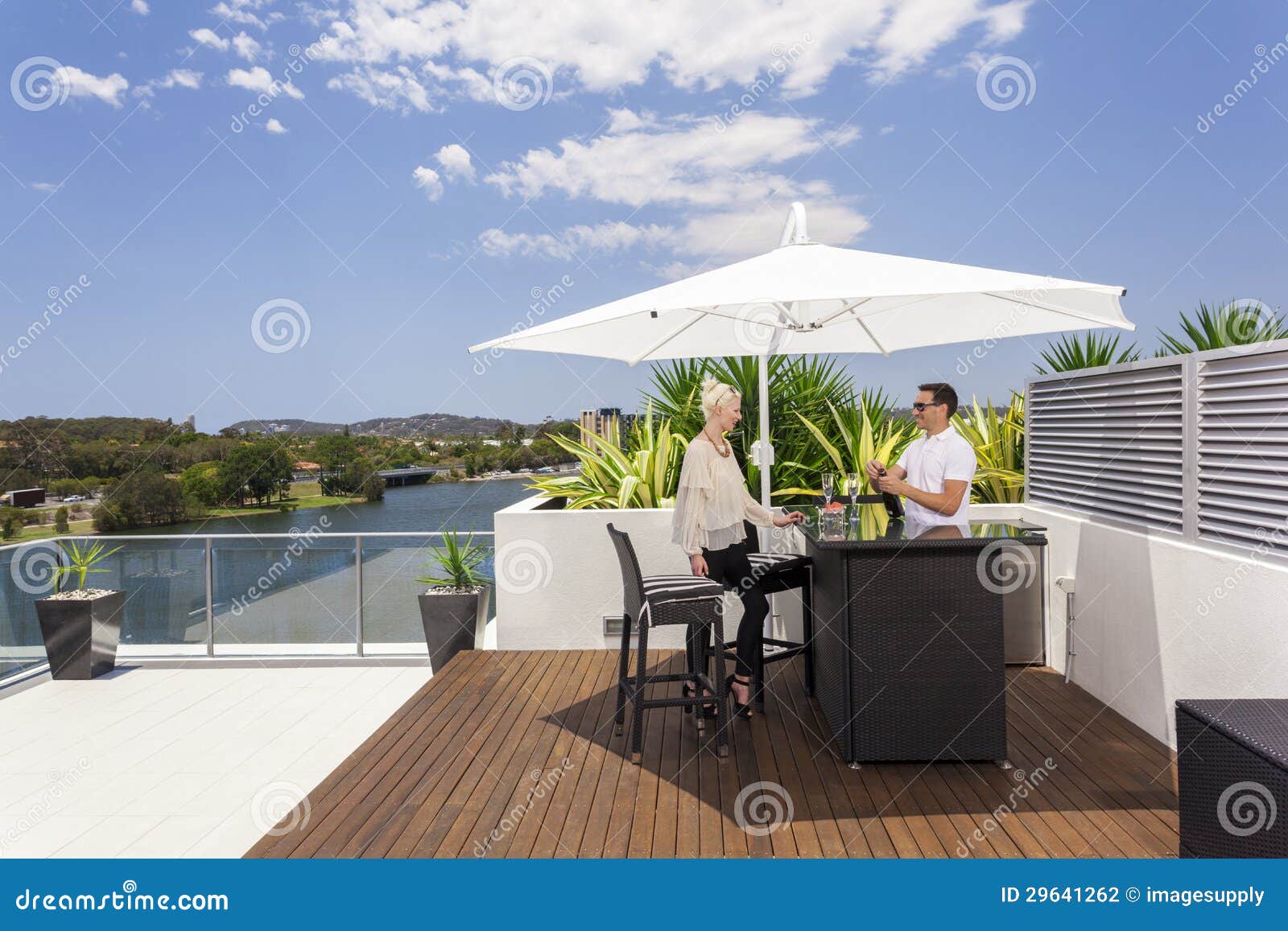 Couple on balcony stock photo. Image of estate, home - 29641262