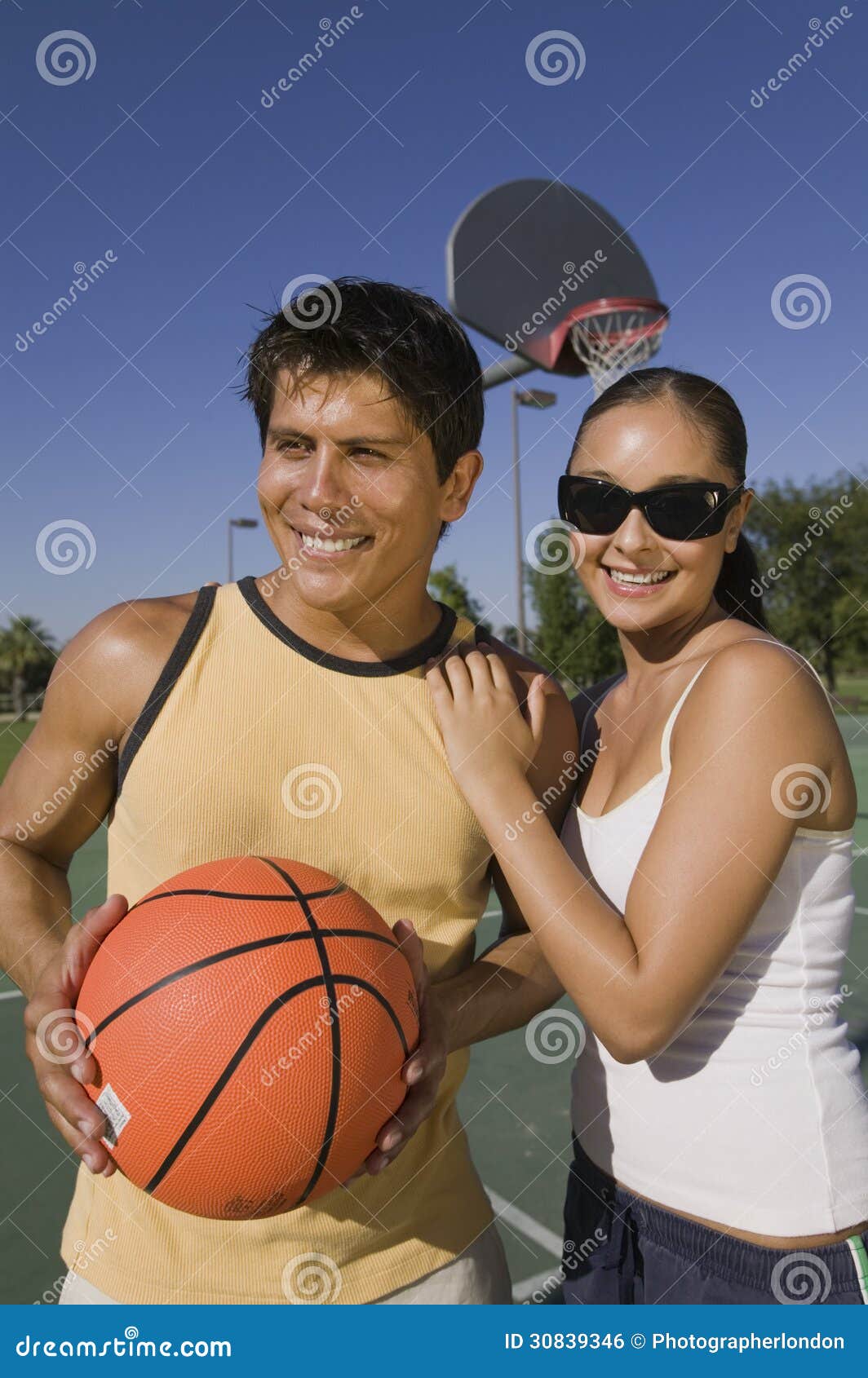 Couple at Basketball Court. Stock Photo - Image of equipment, hoop ...