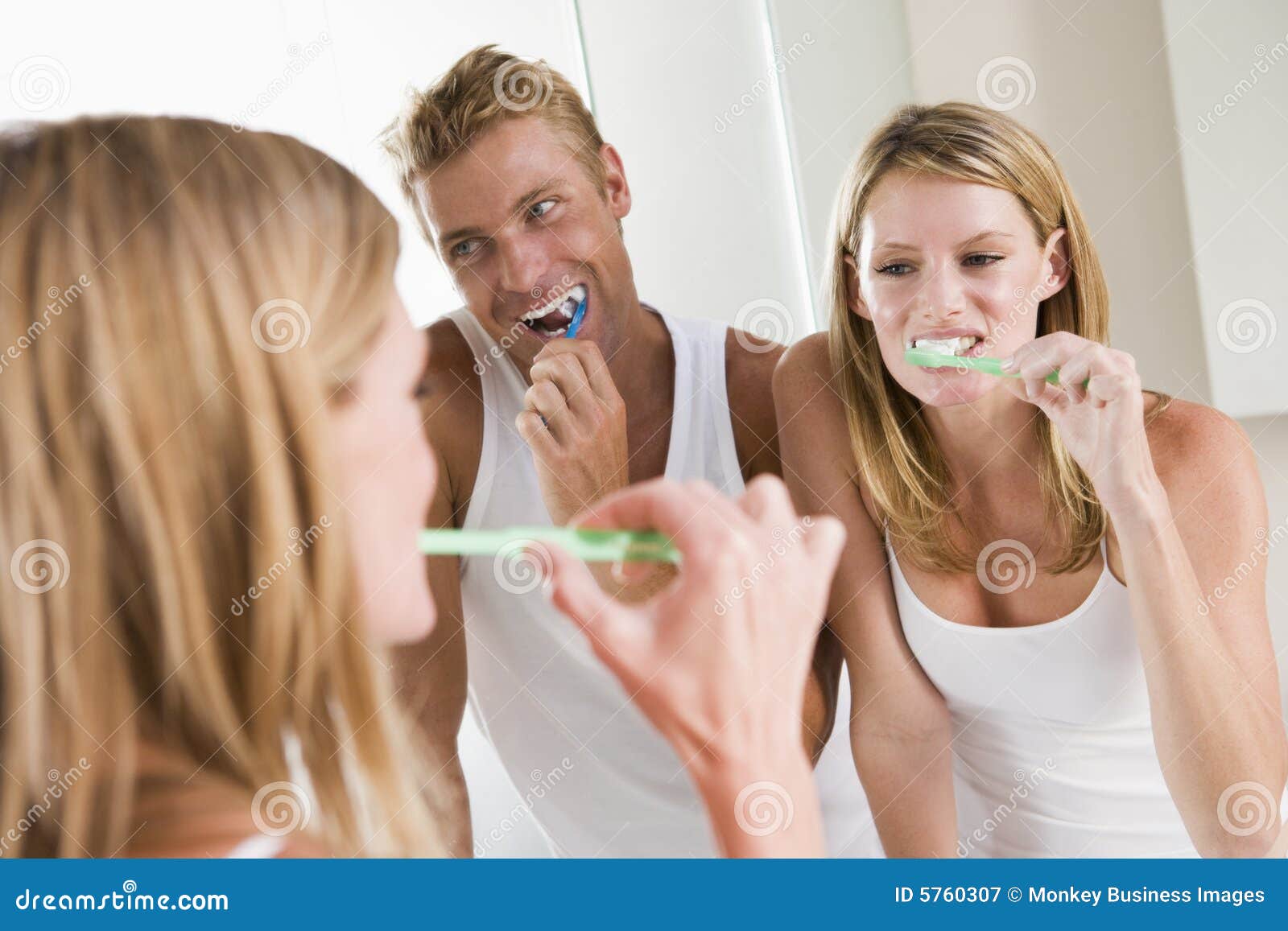 Couple in Bathroom Brushing Teeth Stock Image - Image of husband ...