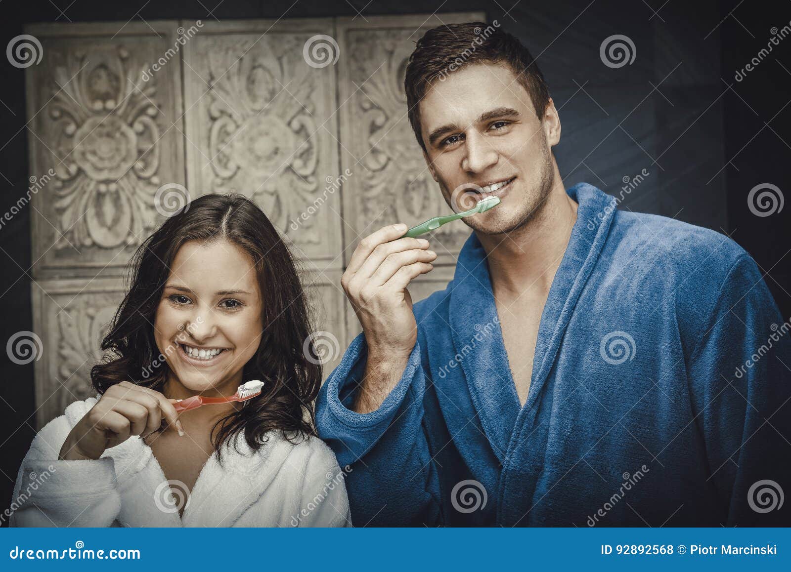 Couple in the Bathroom Brushing Teeth. Stock Photo - Image of morning ...