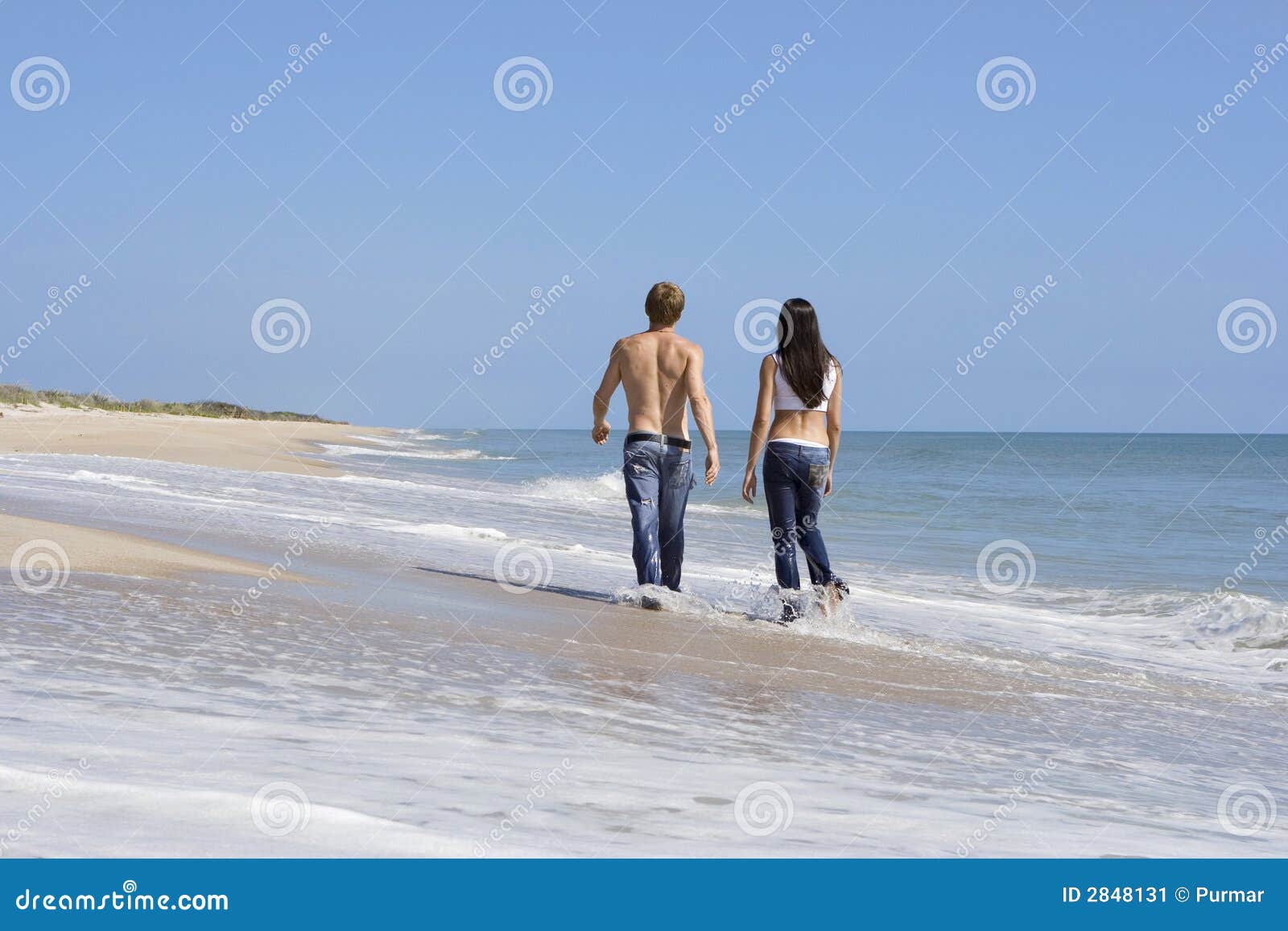Couple on a beach stock image. Image of walk, date, dating - 2848131