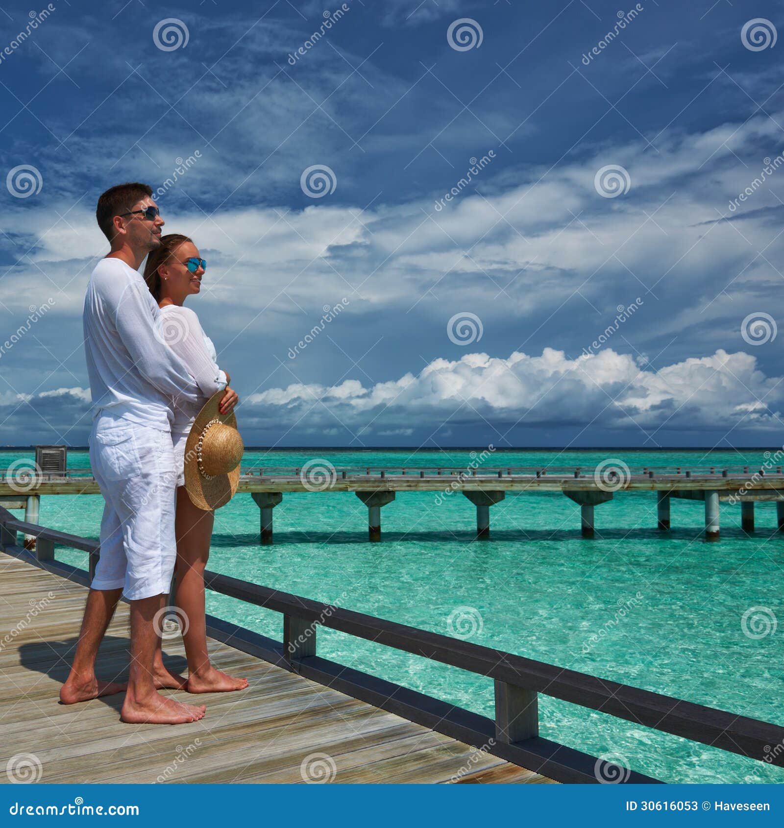 Couple on a Beach Jetty at Maldives Stock Image - Image of beach ...
