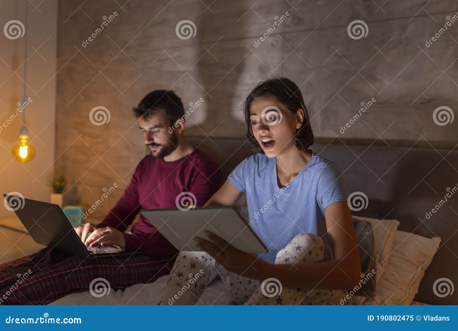 Couple in Bed Using Computers Stock Image - Image of bonding, love ...