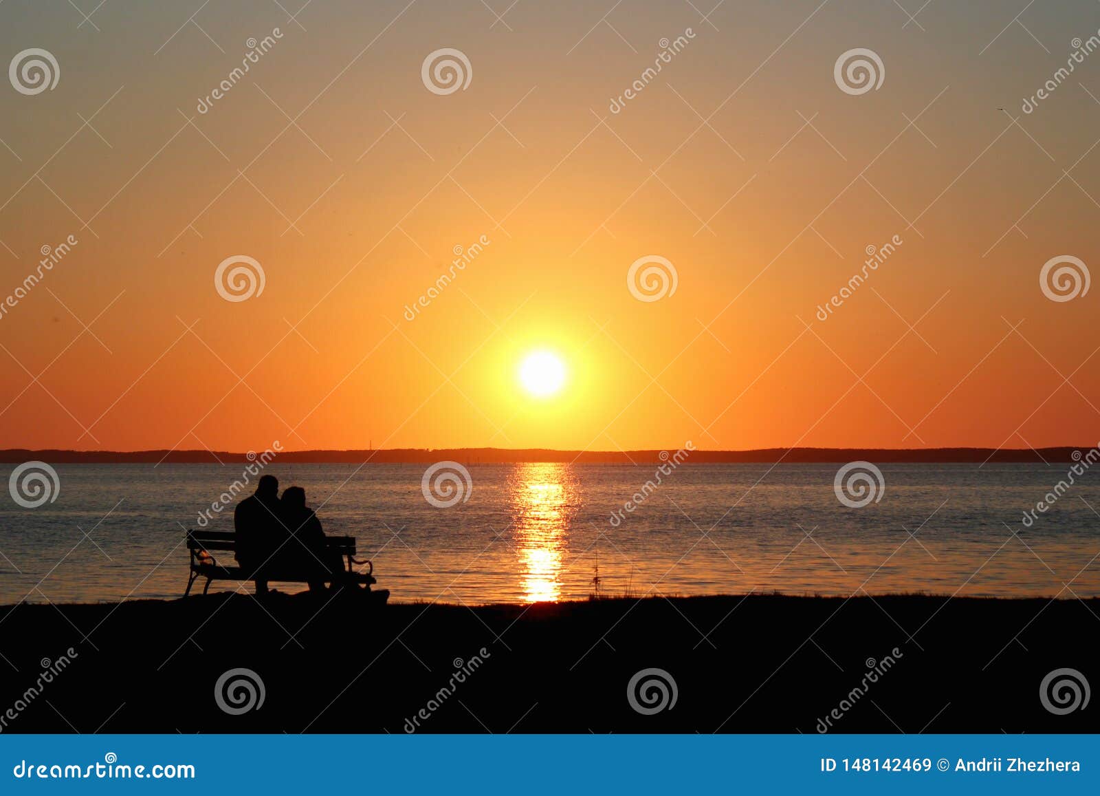 Couple on a Bench Watching the Sunset Stock Image - Image of back ...