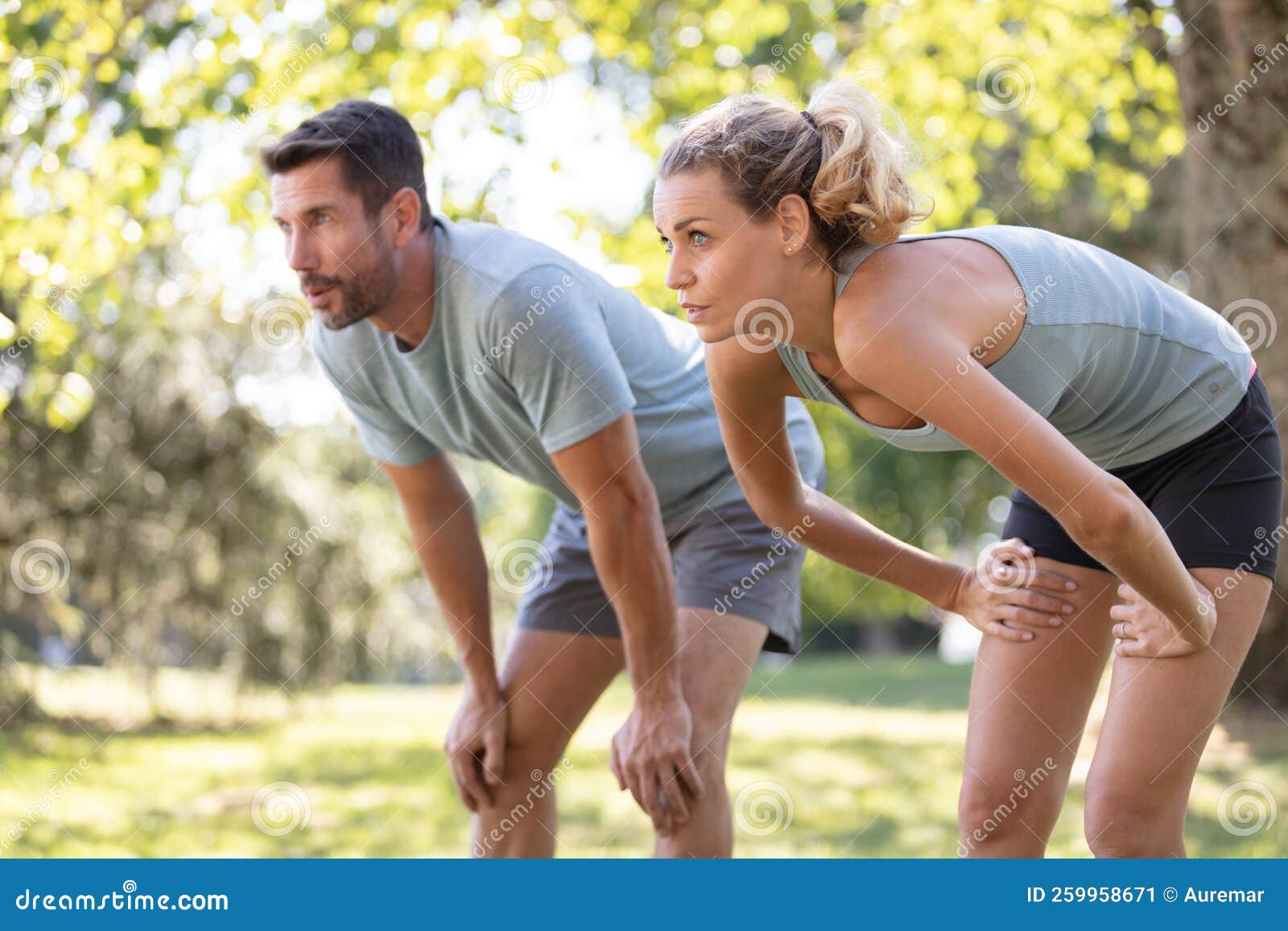 Couple Bent Over Getting Breath Back after Exercising Stock Image - Image of woman, physical ...