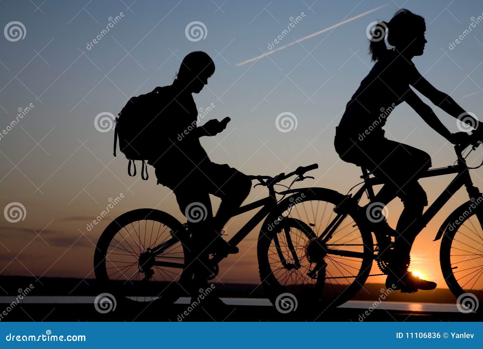 Couple bicycler on sunset stock photo. Image of evening - 11106836