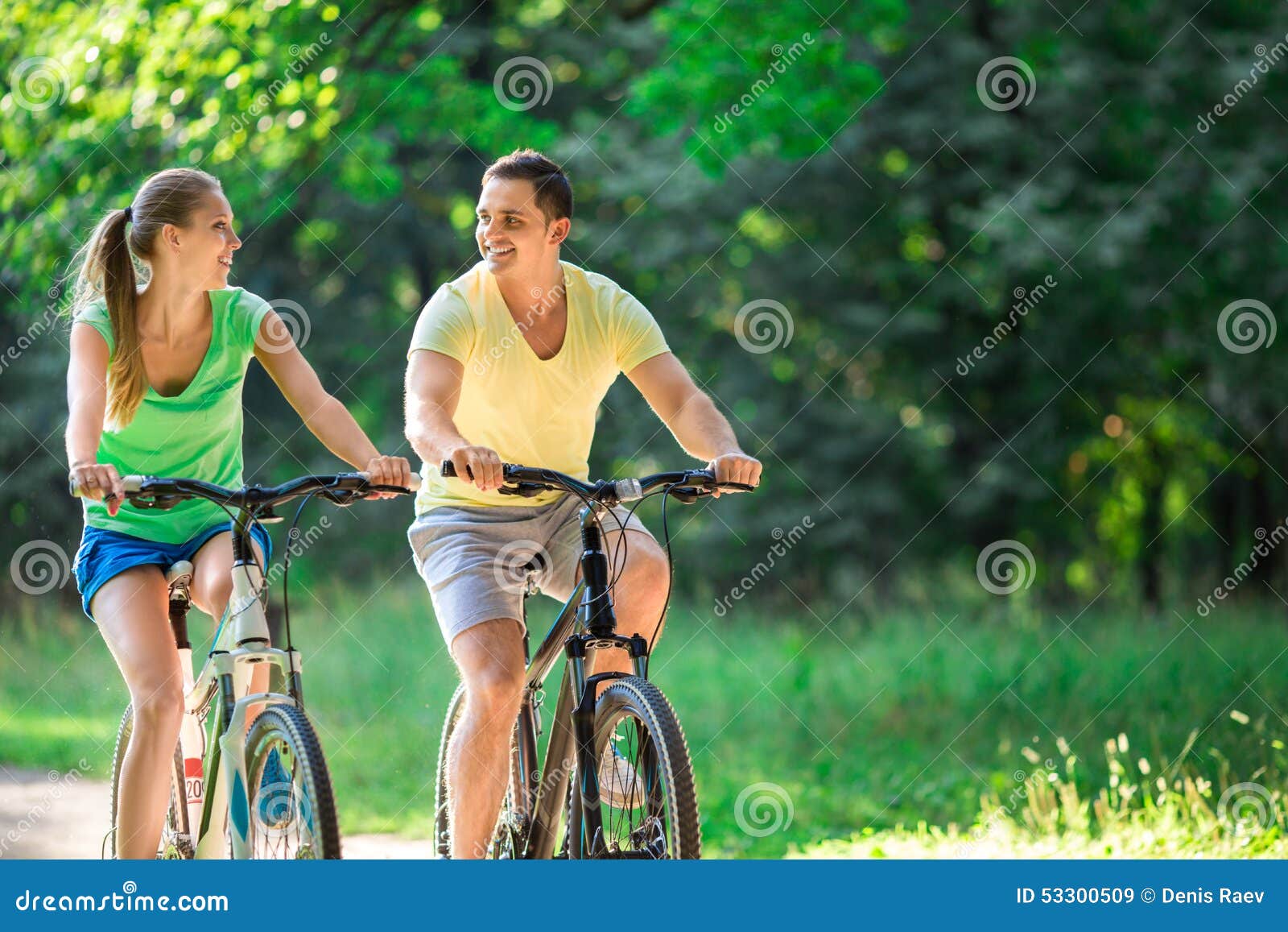 Couple on bicycles stock image. Image of caucasian, outdoors - 53300509