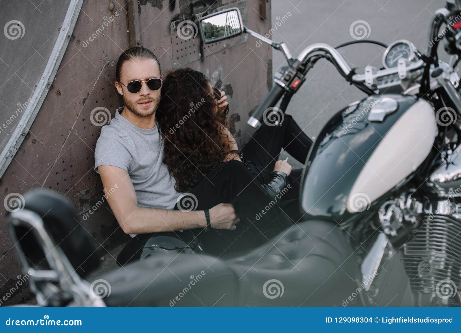 Couple of Bikers Hugging on Asphalt with Classical Stock Photo - Image ...