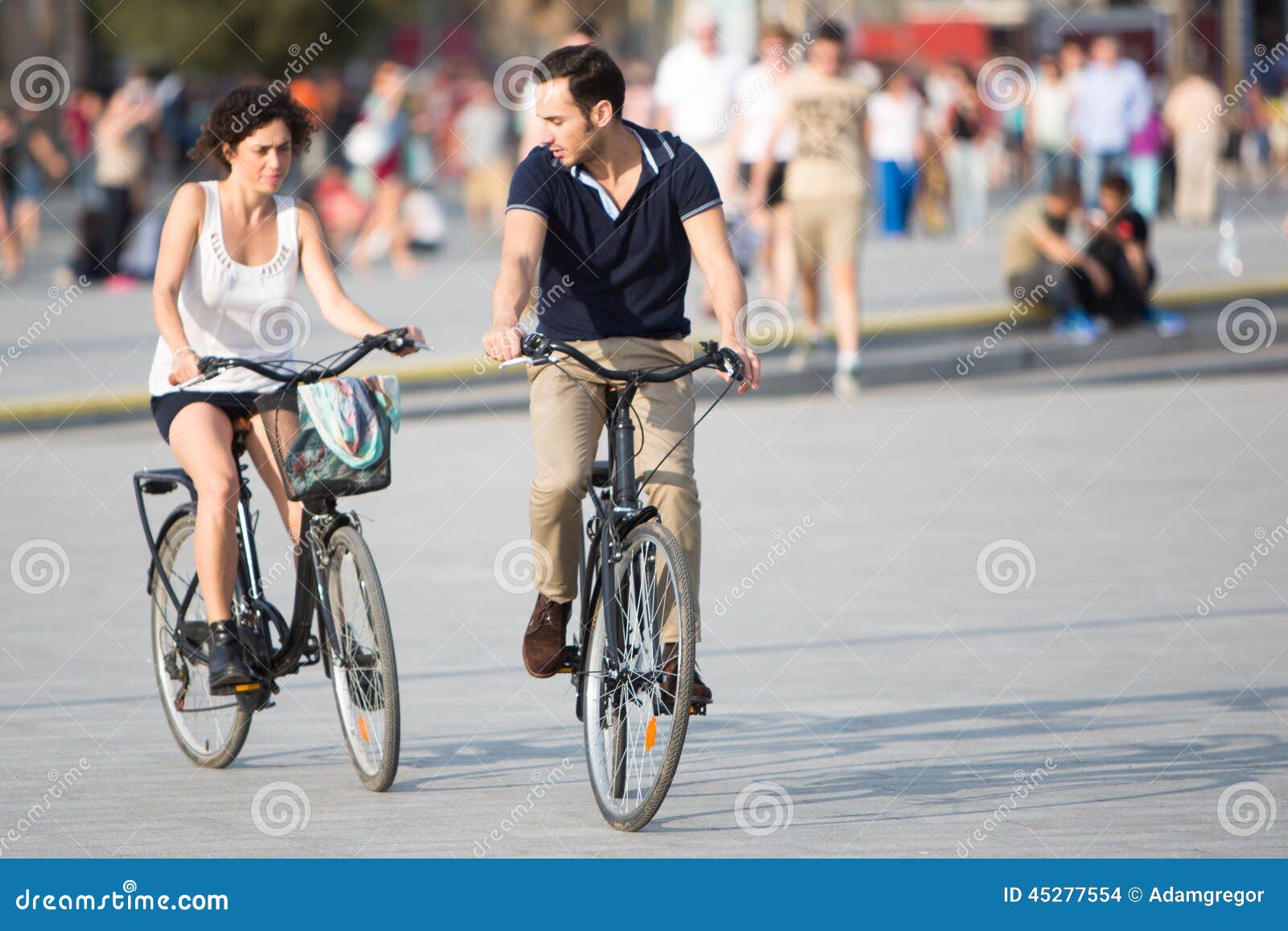 Couple with Bikes on a City Beach Stock Photo - Image of beautiful ...