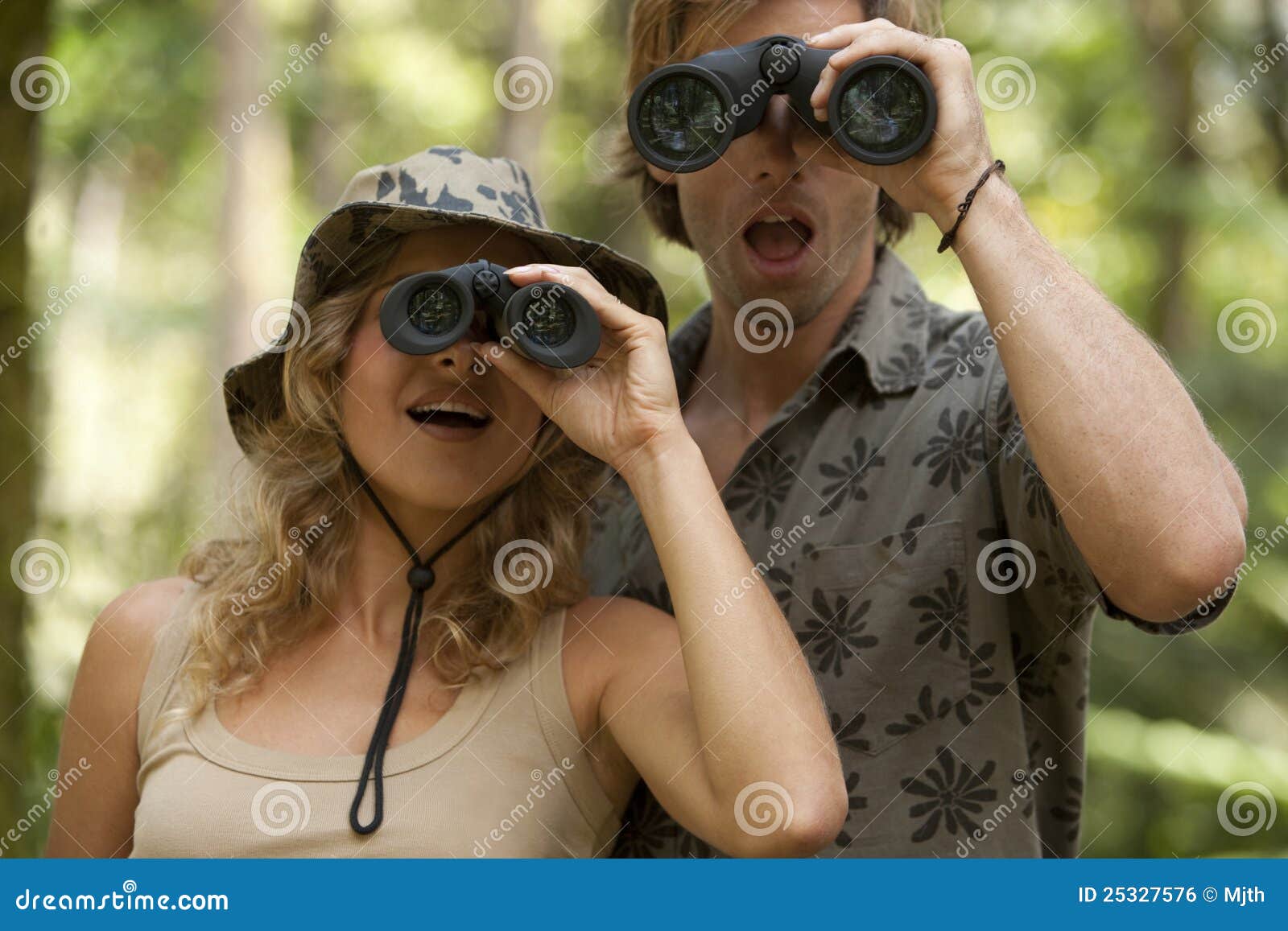 Couple with Binoculars stock photo. Image of camouflage - 25327576
