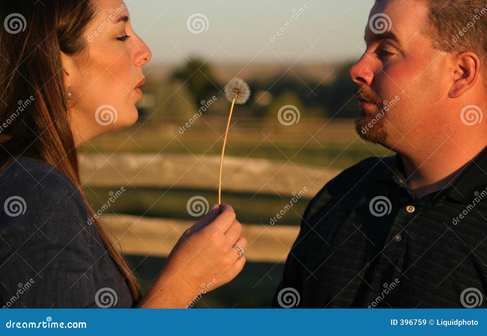 Couple Blowing Kisses 1 stock image. Image of expressions - 396759