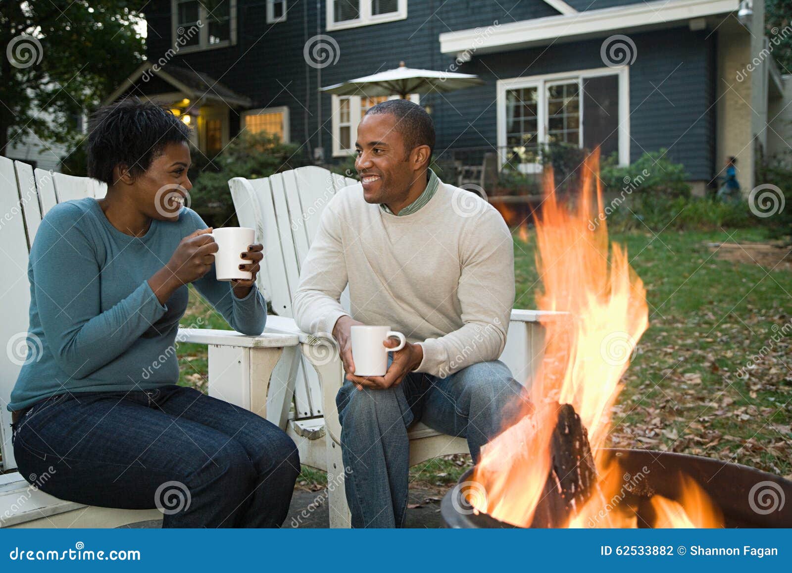 Couple by bonfire stock photo. Image of fire, couple - 62533882