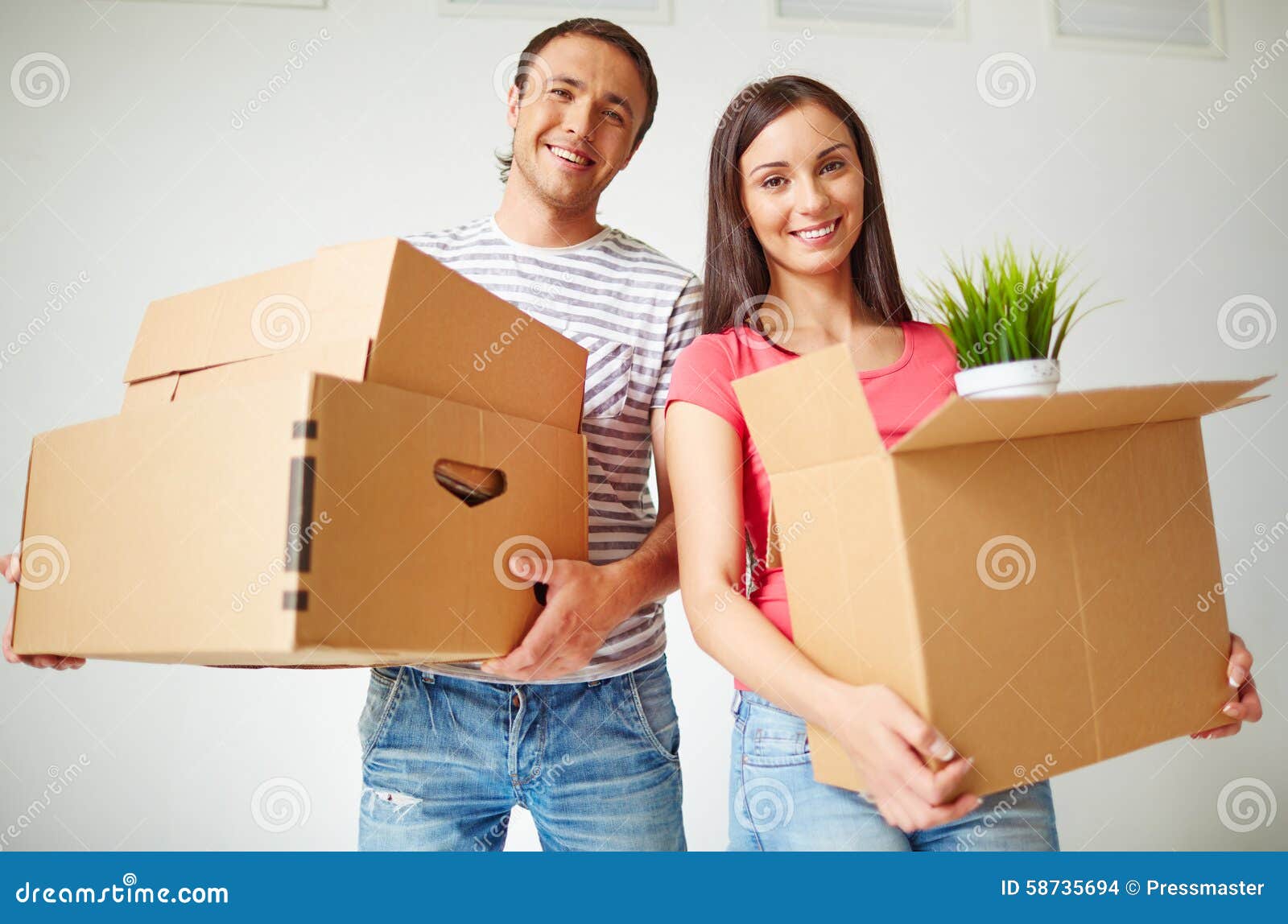 Couple with boxes stock photo. Image of house, family - 58735694