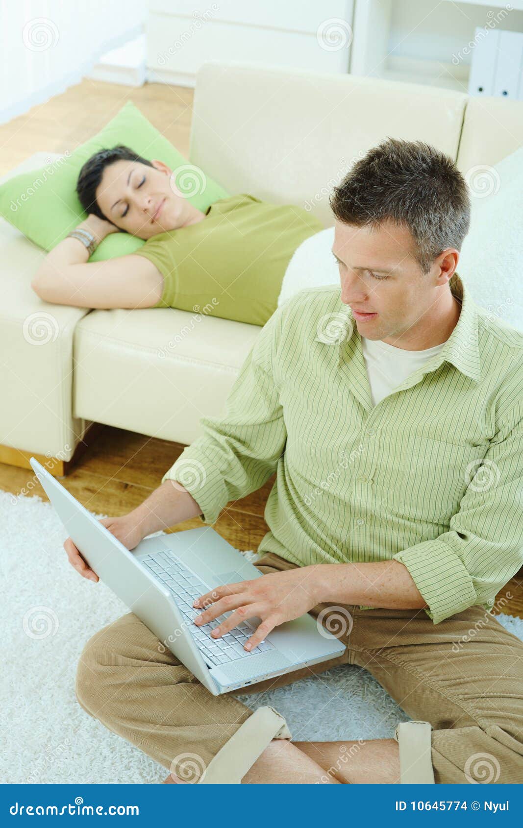 Couple browsing internet stock photo. Image of green - 10645774