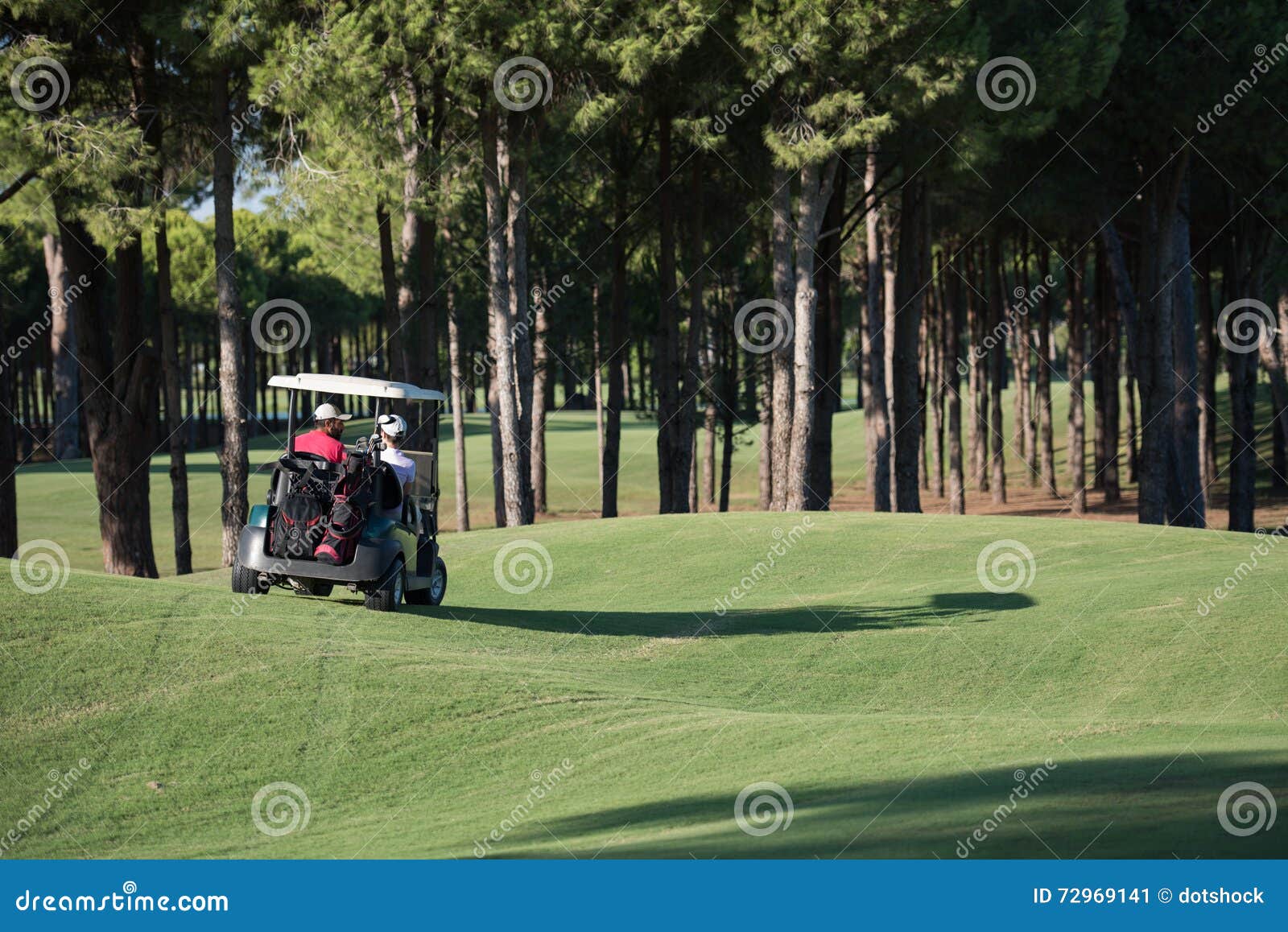 Couple in Buggy on Golf Course Stock Image - Image of arab, golf: 72969141