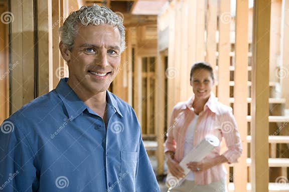 Couple Building Home stock photo. Image of forties, blueprints - 12666510