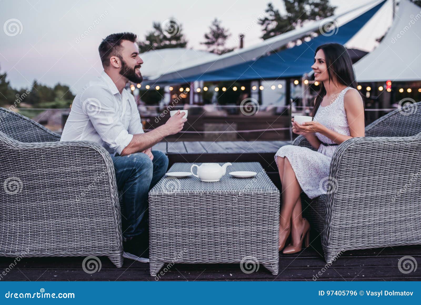 Couple in cafe outdoors stock photo. Image of lifestyle - 97405796