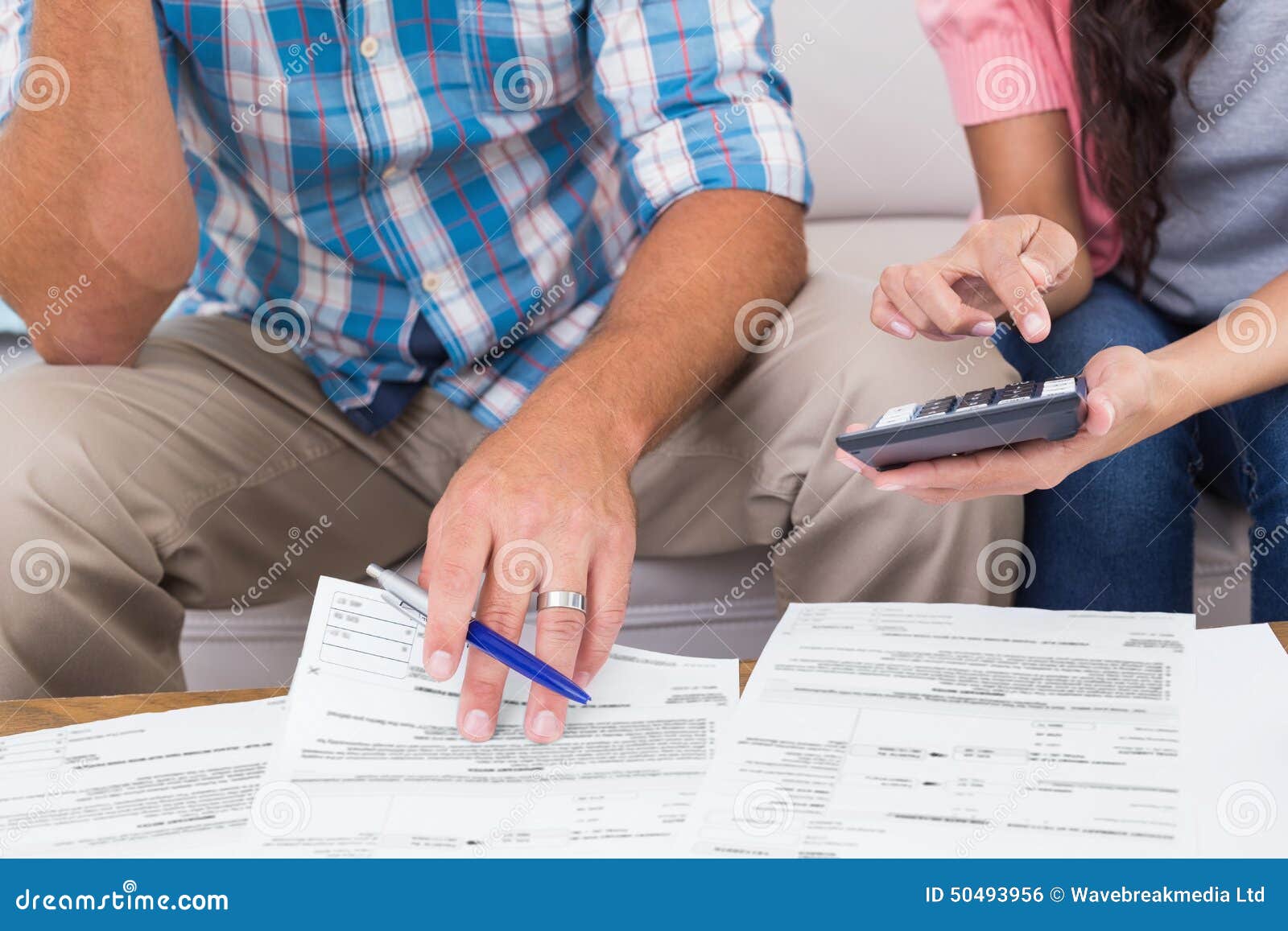 Couple Calculating Finances at Home Stock Photo - Image of finance ...