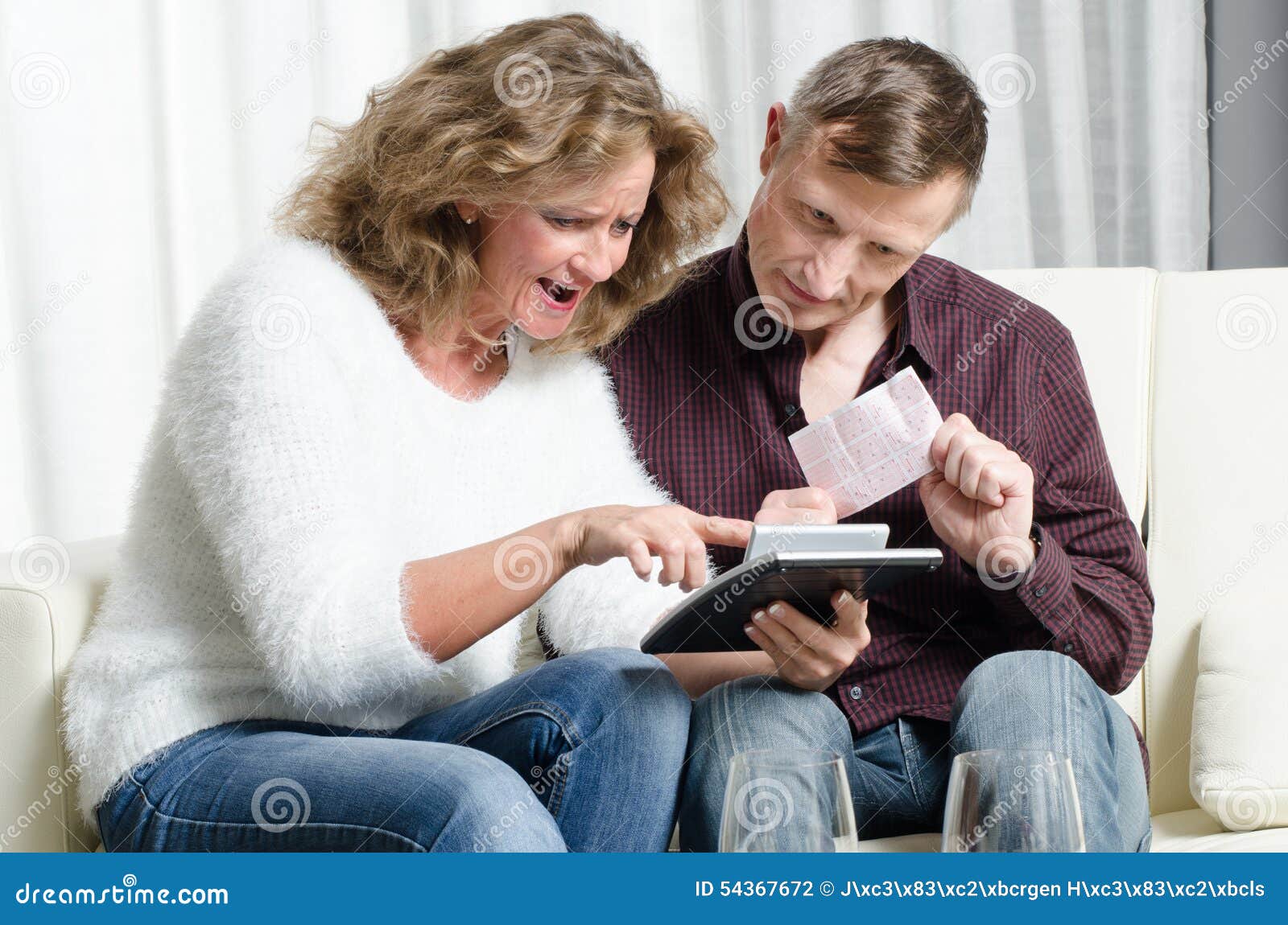 Couple is Calculating Lottery Win Stock Photo - Image of feelings ...