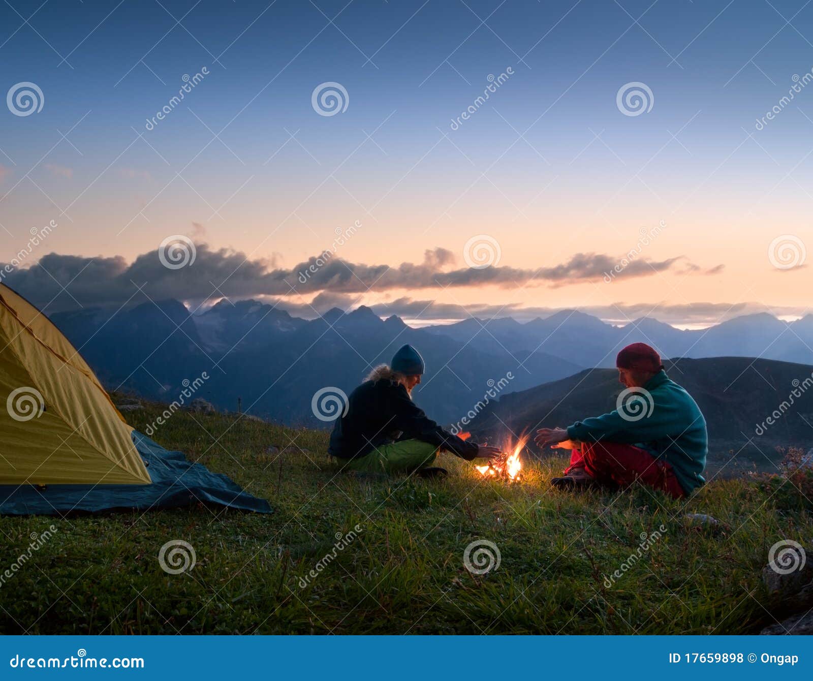 Couple camping at night stock photo. Image of trek, travel - 17659898