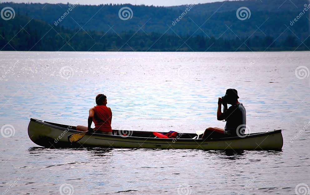 Couple in canoe stock photo. Image of love, boating, camera - 1883964