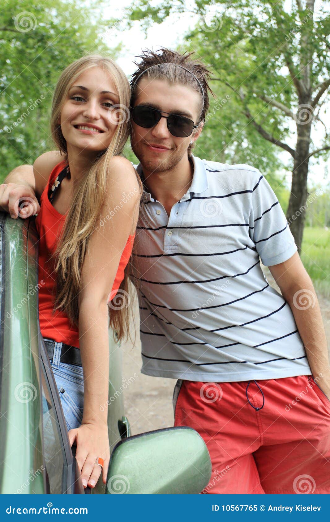 Couple with a car stock image. Image of female, friendship - 10567765