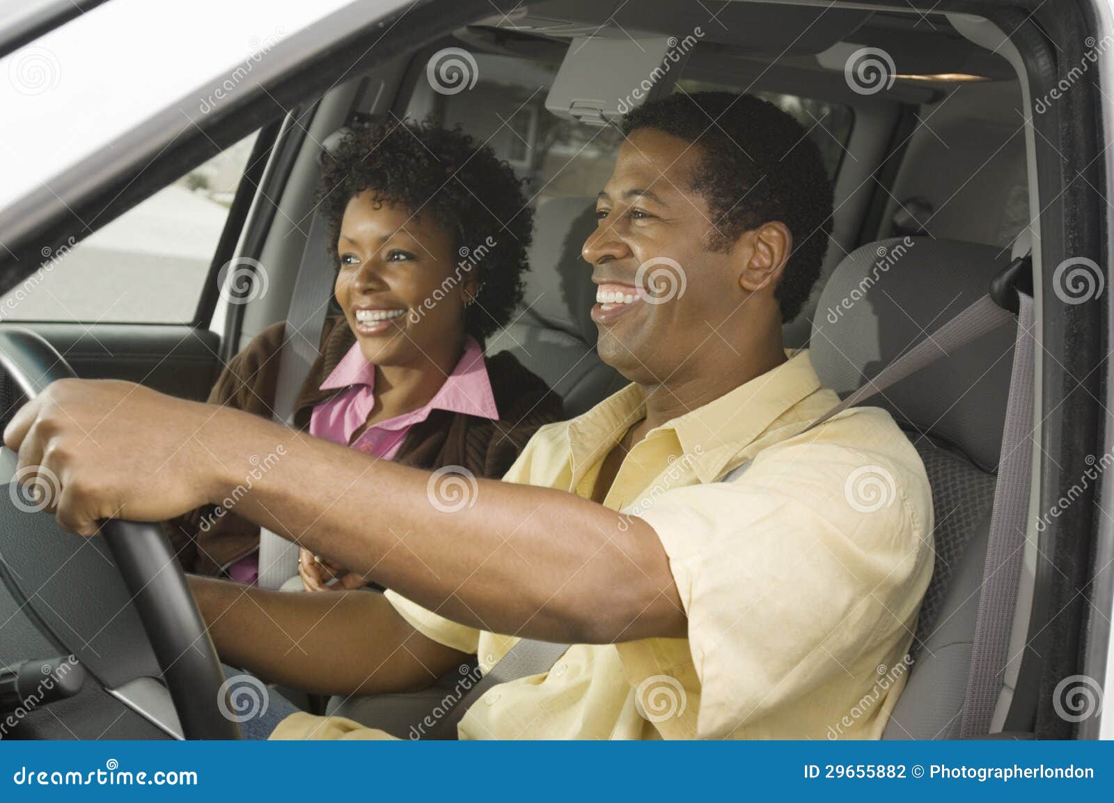 Couple in a Car stock photo. Image of riding, aged, happiness - 29655882