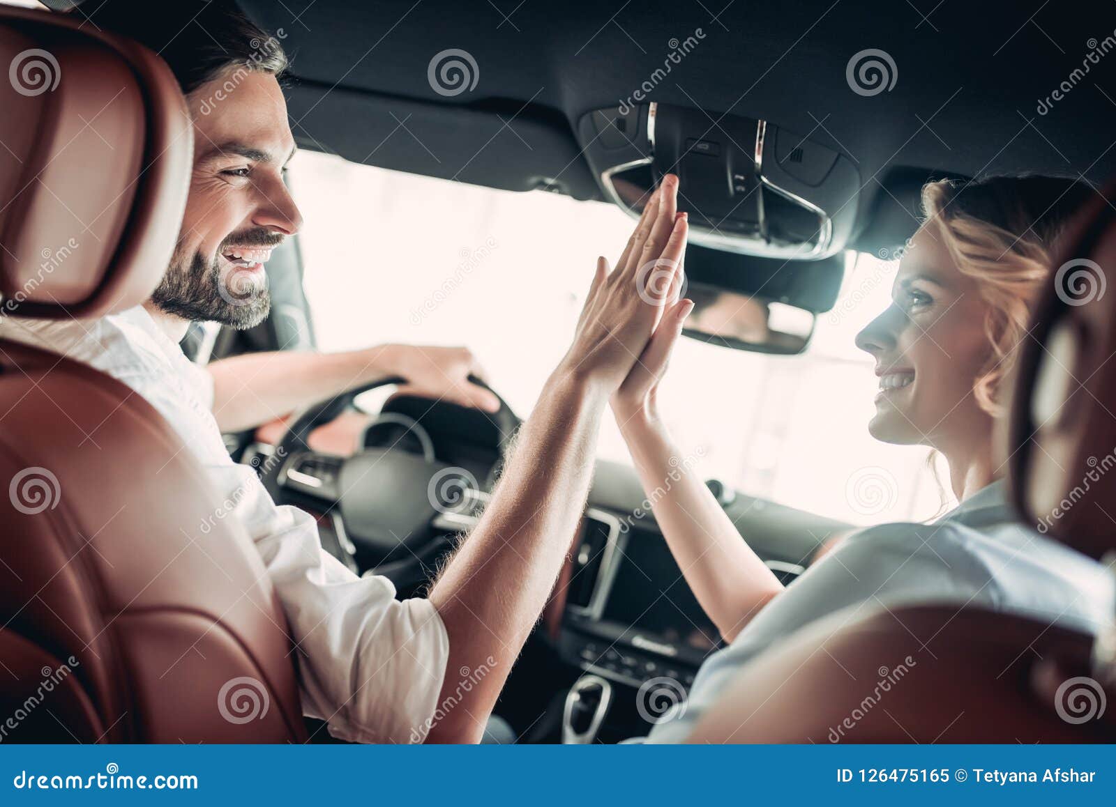 Couple in the Car Giving High Five Stock Image - Image of daytime ...
