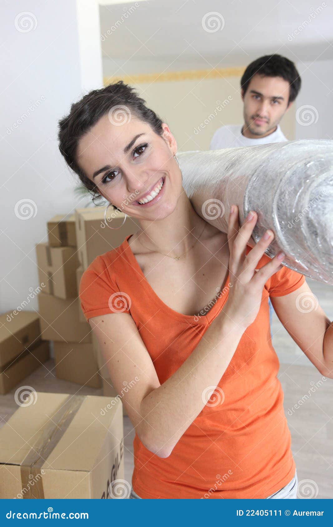 Couple carrying a carpet stock image. Image of male, affectionate ...