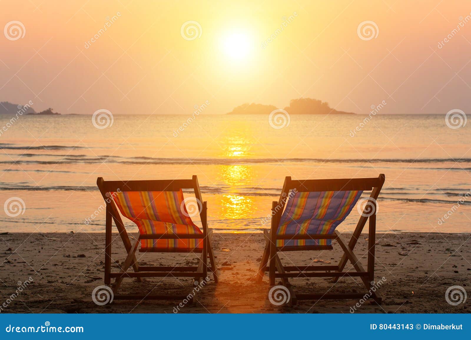 A Couple of Chairs on Sunset Beach. Relax. Stock Image - Image of sand ...