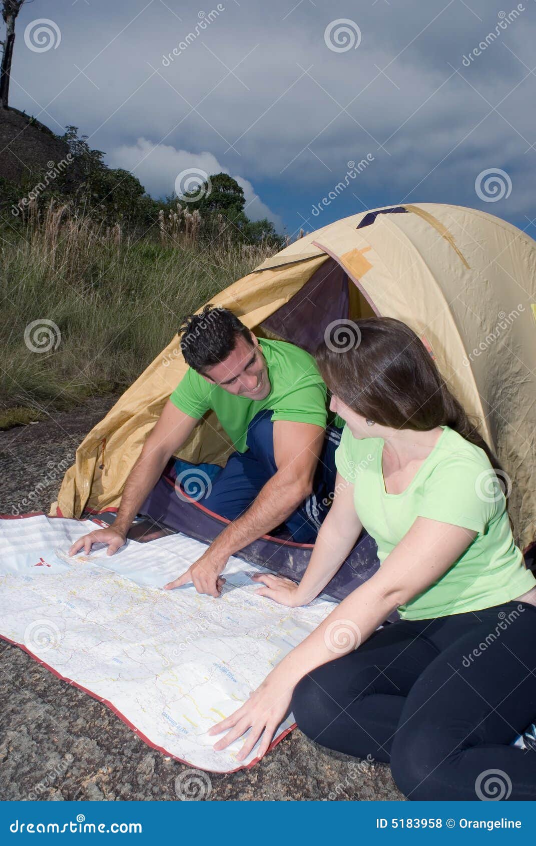 Couple Checking a Map stock photo. Image of outdoors, female - 5183958