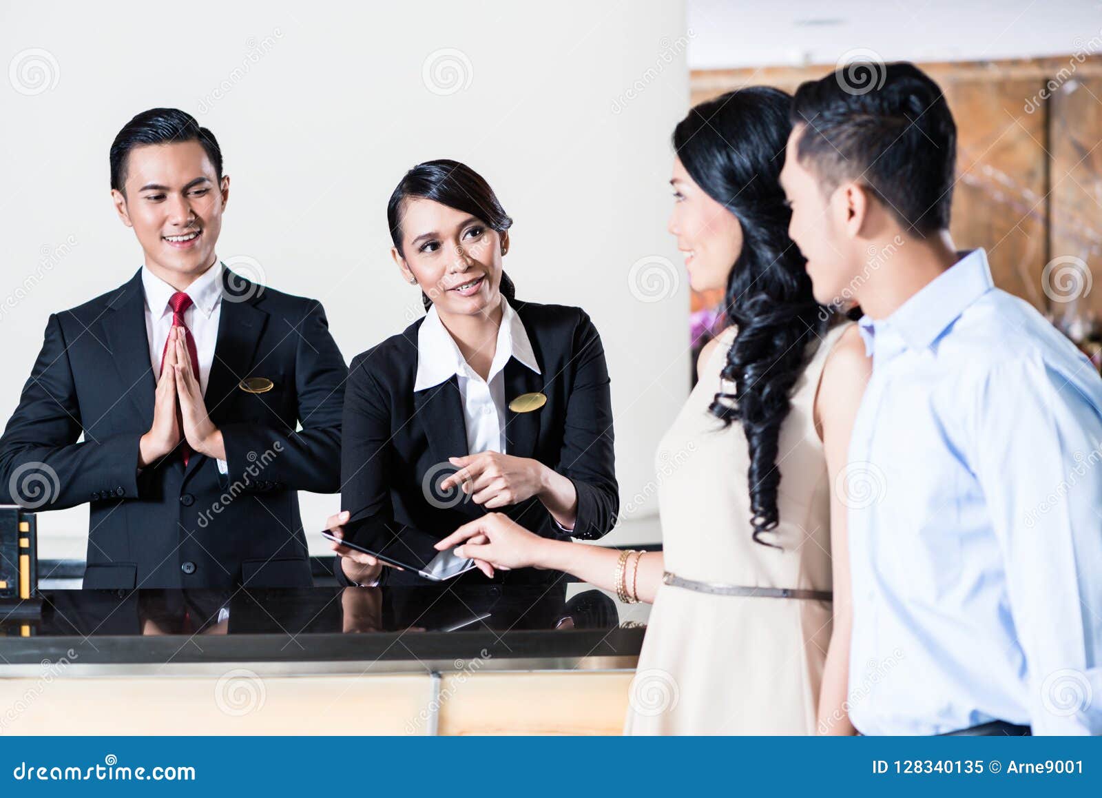 Couple Checking in To Hotel Stock Image - Image of love, couple: 128340135