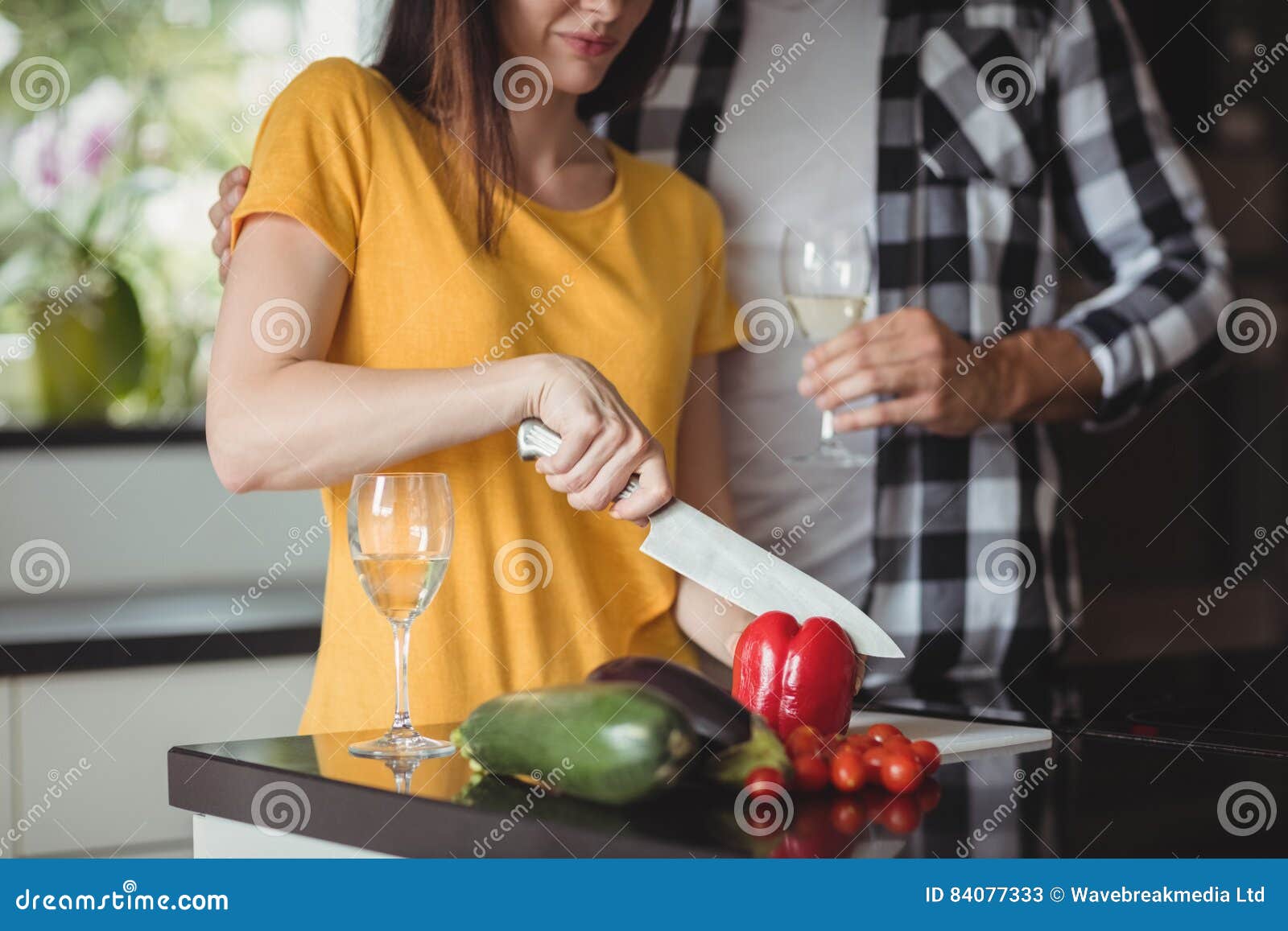 Couple Chopping Vegetables in Kitchen Stock Image - Image of champagne ...