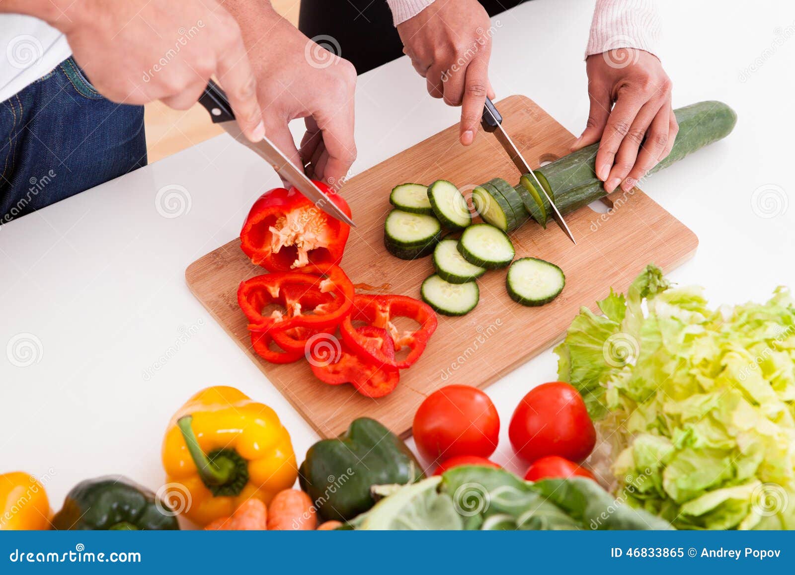 Couple chopping vegetables stock image. Image of accuracy - 46833865