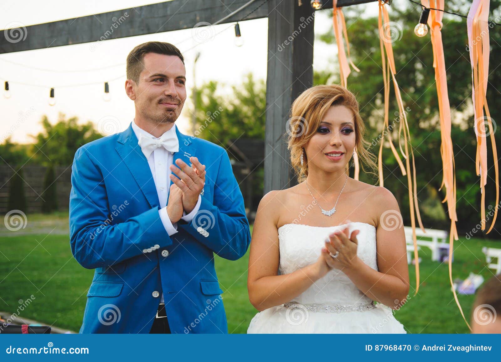 Couple Clapping Hands at Yard Stock Photo - Image of caucasian, person ...