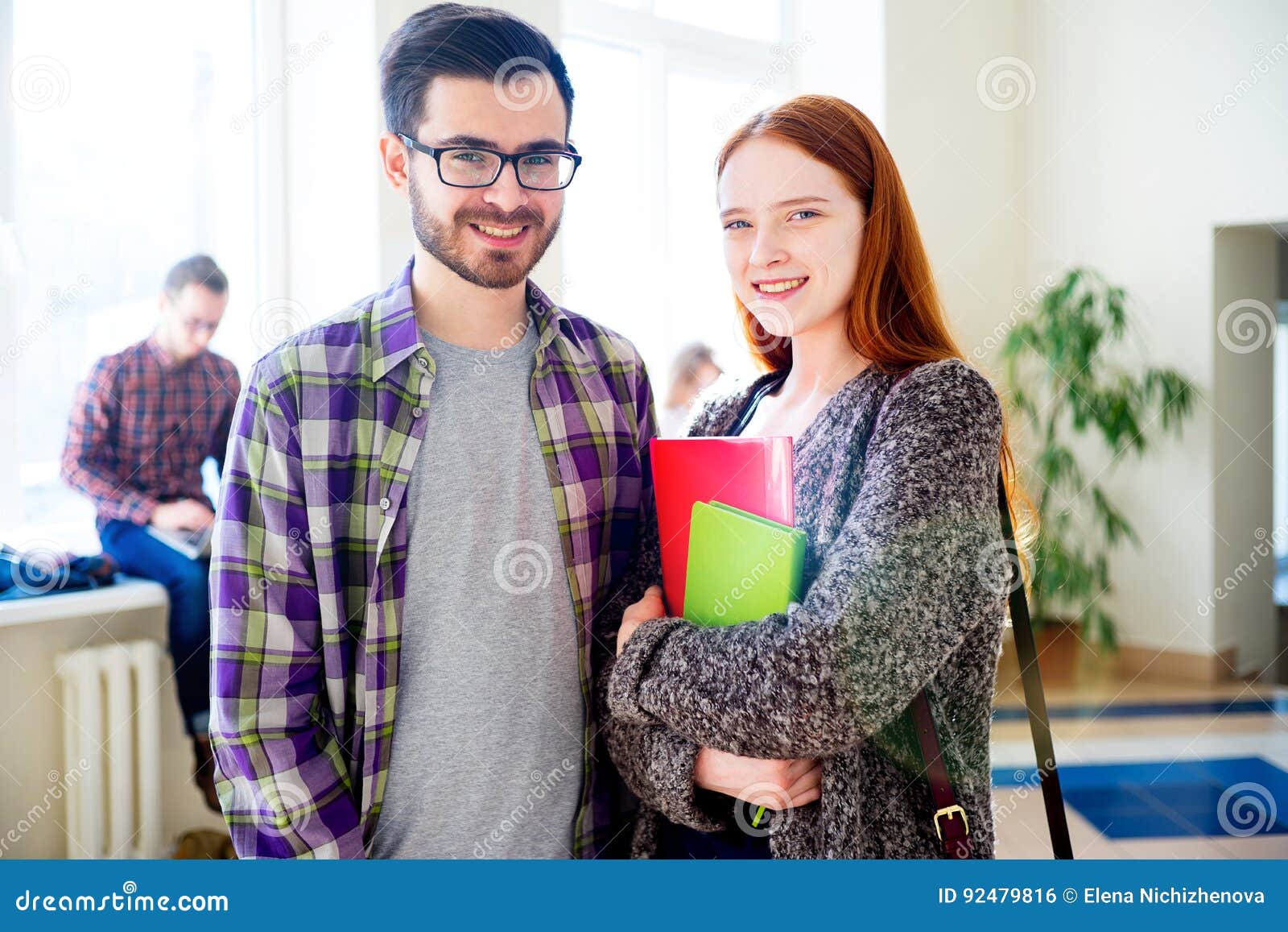 Couple of college students stock photo. Image of book - 92479816
