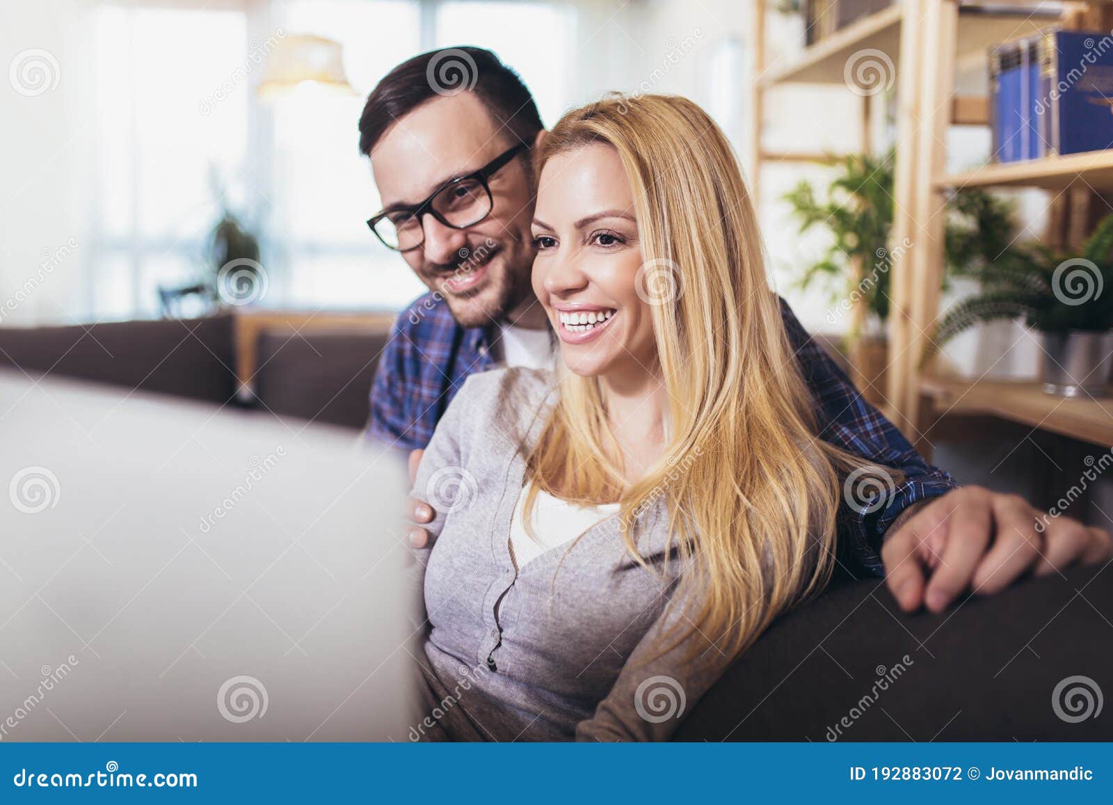 Couple Communicating while Using Laptop at Home Stock Photo - Image of ...