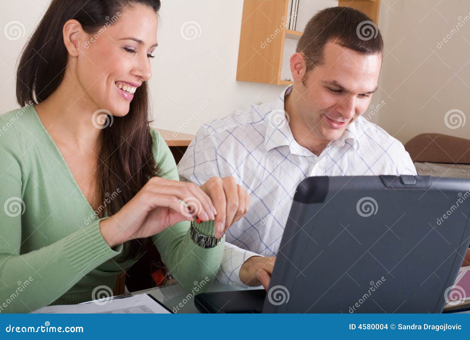 Couple and computer stock photo. Image of budget, adult - 4580004