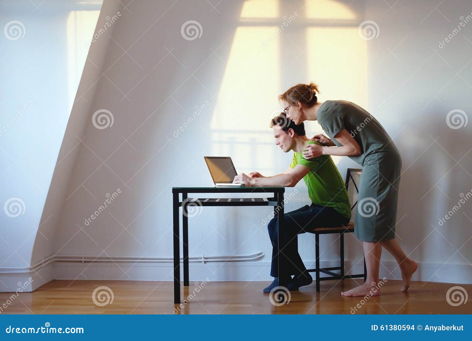 Couple with Computer at Home Stock Photo - Image of copy, laptop: 61380594