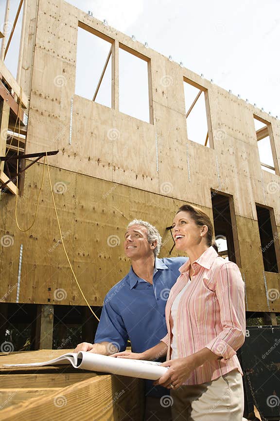 Couple on Construction Site. Stock Image - Image of construction ...