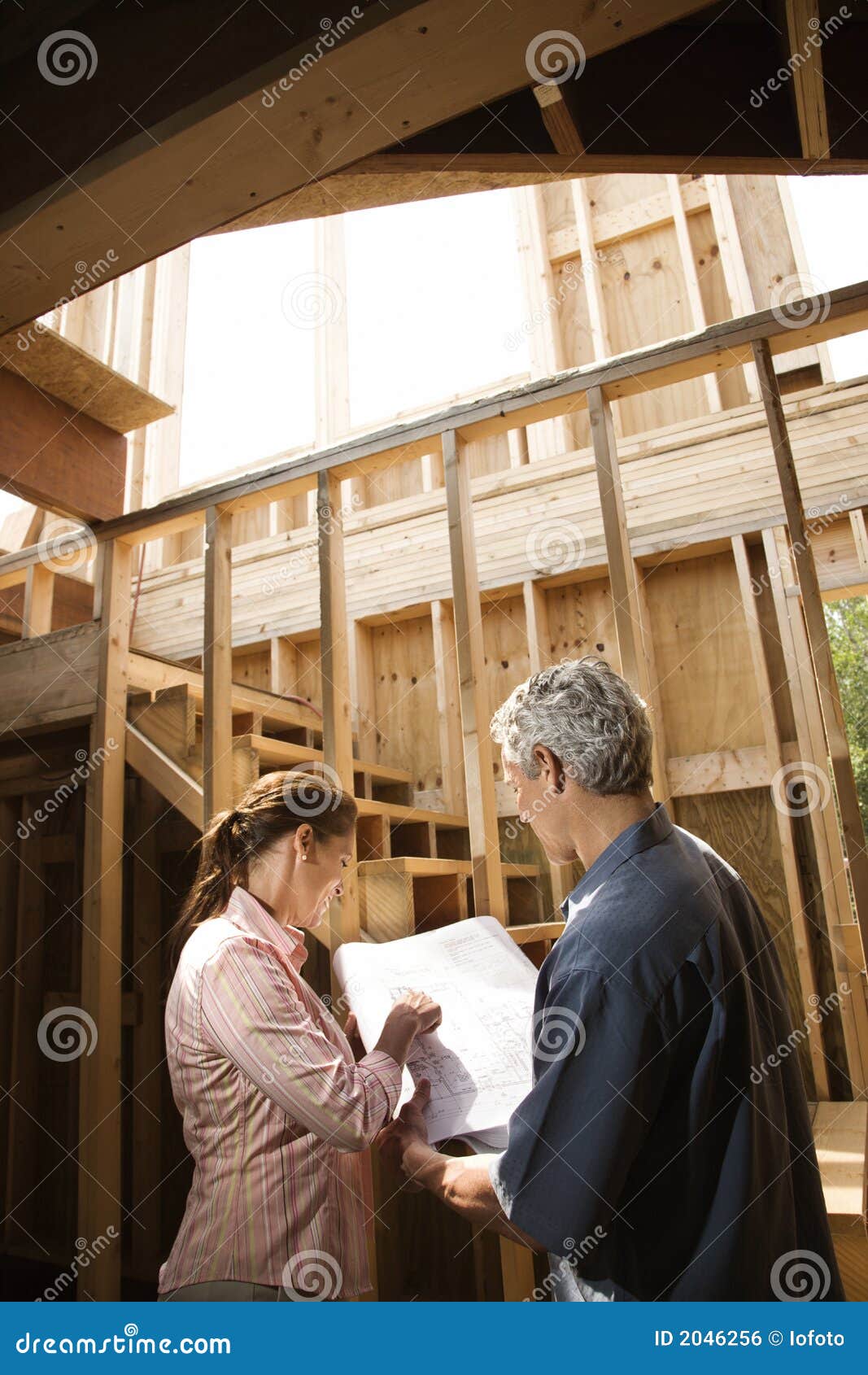 Couple on Construction Site. Stock Photo - Image of building ...