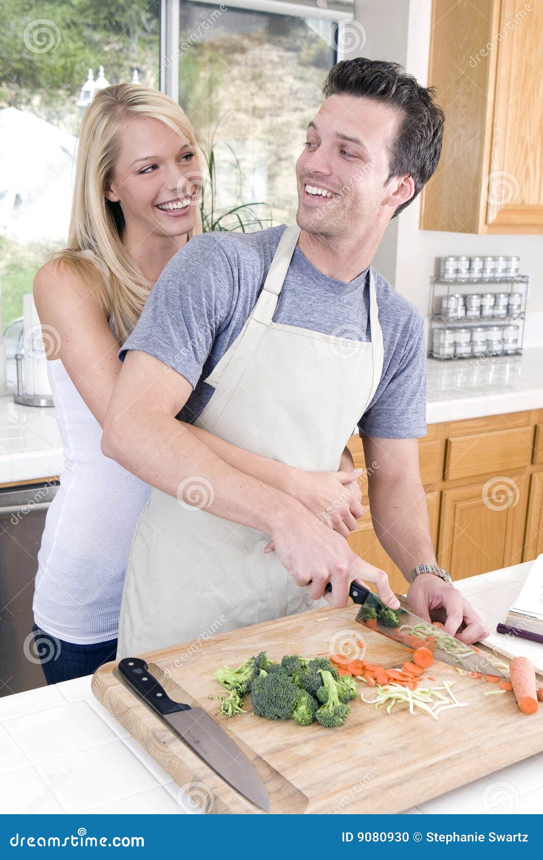 Couple cooking stock photo. Image of female, book, cheerful - 9080930