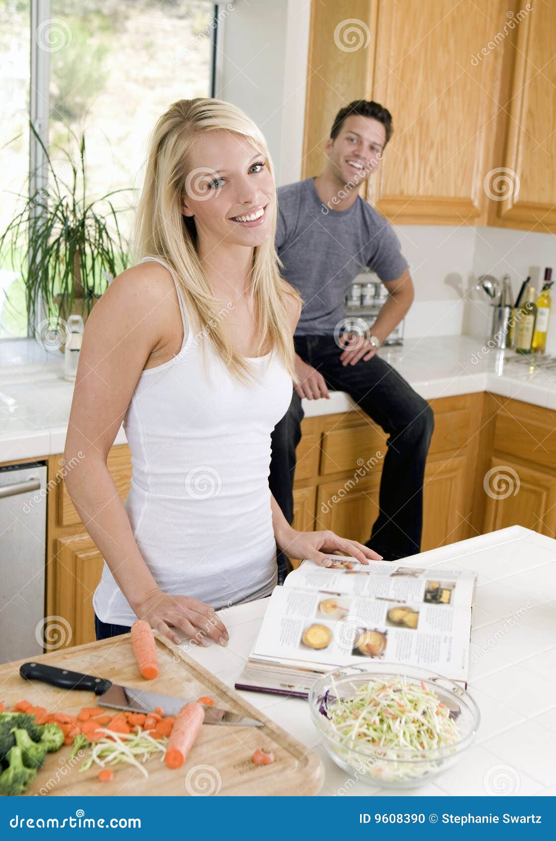 Couple cooking stock photo. Image of interacting, cookbook - 9608390