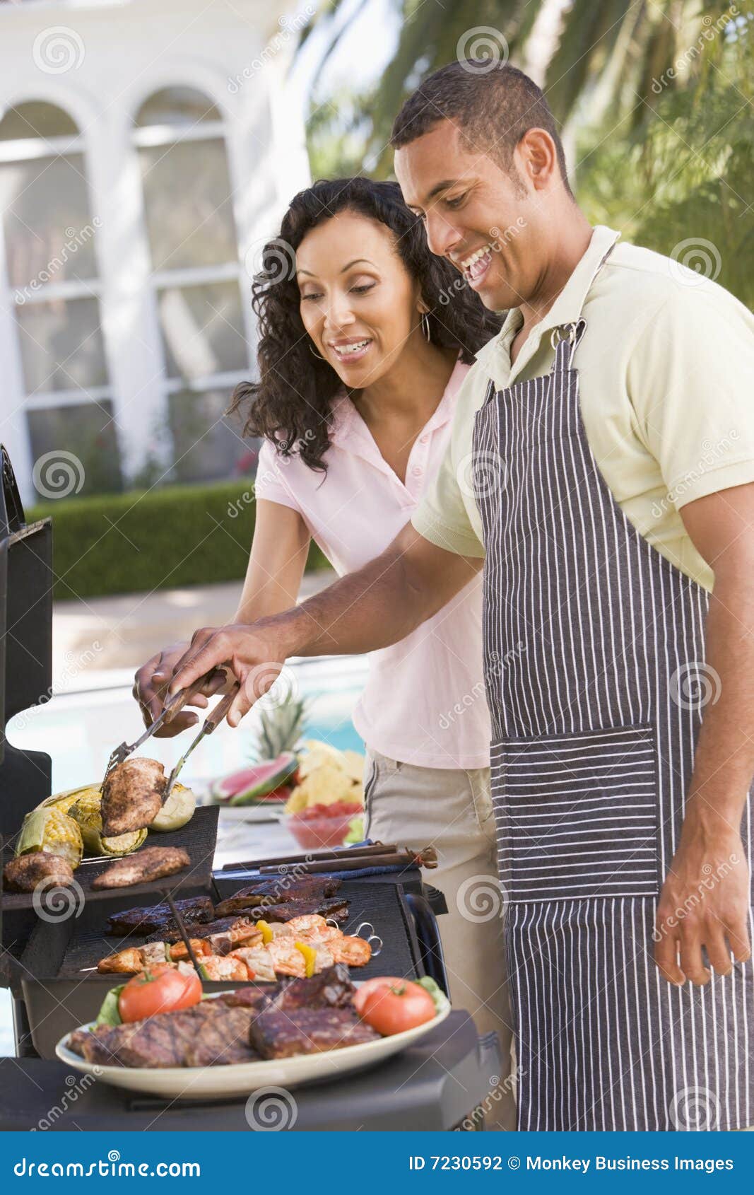 Couple Cooking on a Barbeque Stock Photo - Image of home, three: 7230592