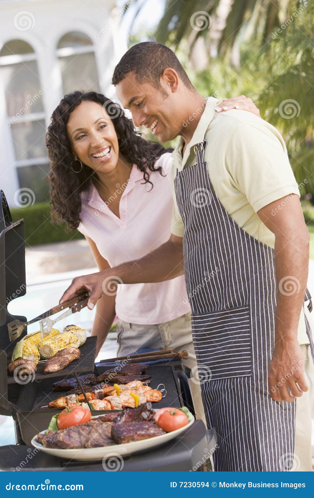 Couple Cooking on a Barbeque Stock Photo - Image of couple, three: 7230594