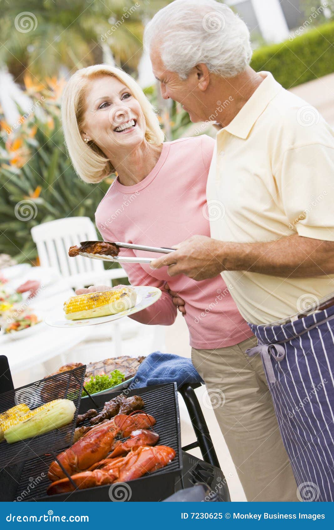 Couple Cooking on a Barbeque Stock Image - Image of colour, three: 7230625