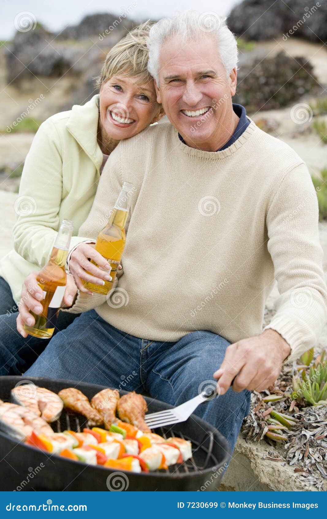 Couple Cooking Barbeque on a Beach Stock Image - Image of outside ...