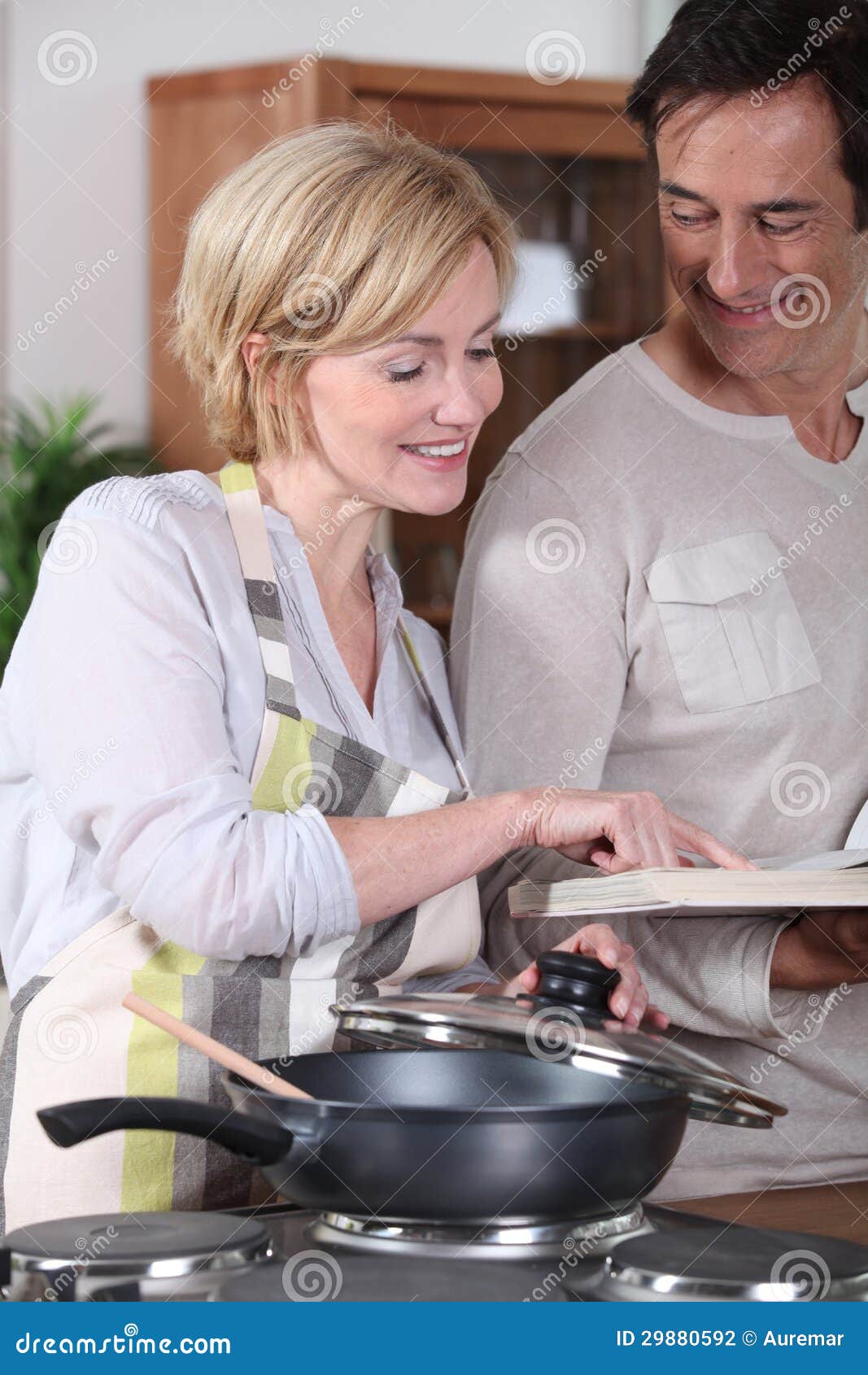 Couple cooking dinner stock photo. Image of laugh, husband - 29880592