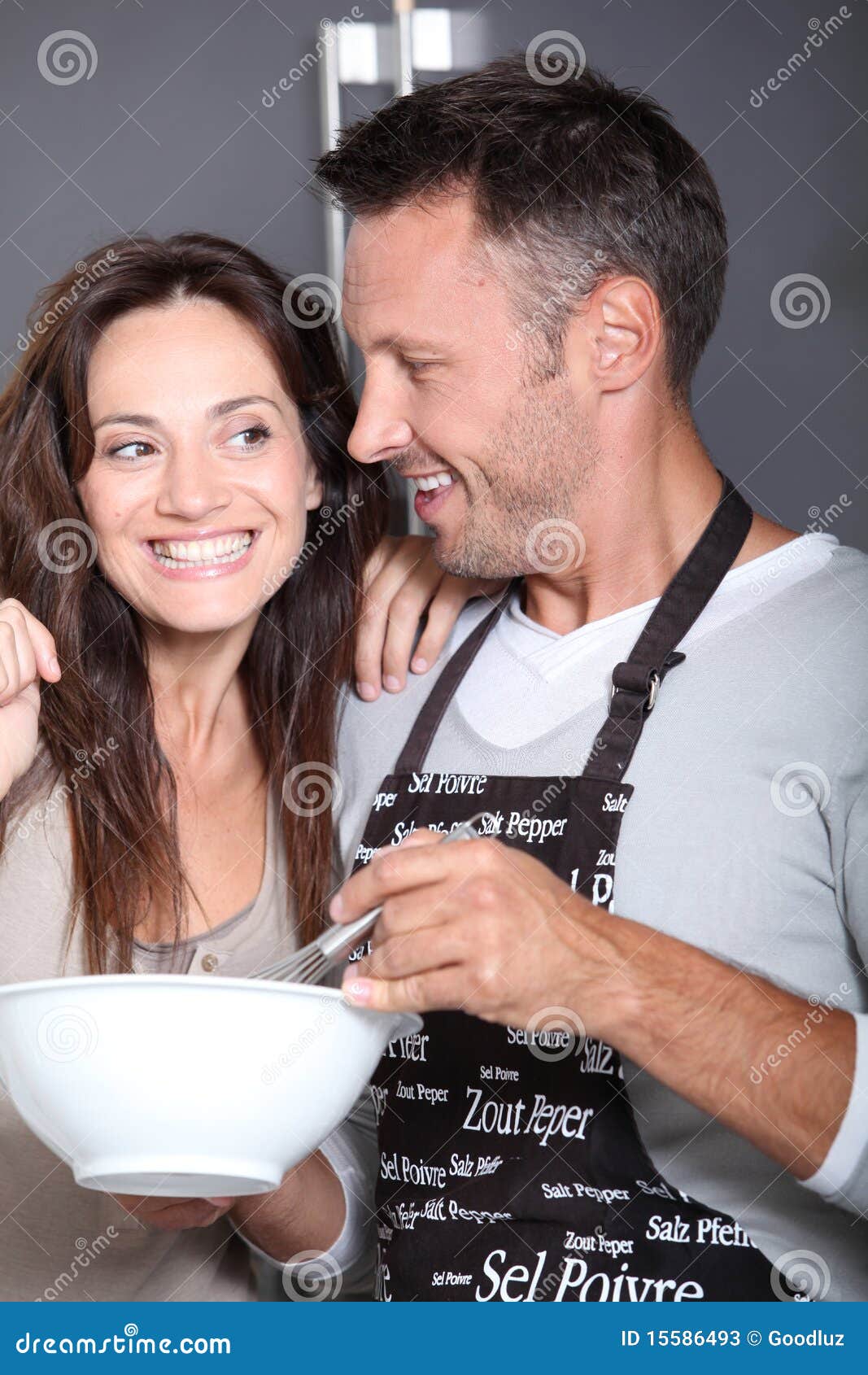 Couple cooking together stock image. Image of caucasian - 15586493